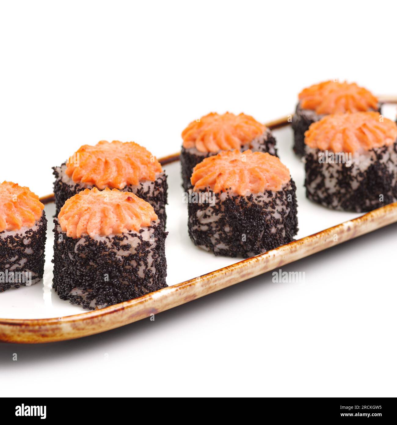 Baked uramaki sushi rolls set with Rice, Nori, Masago Roe, Cucumbers ...