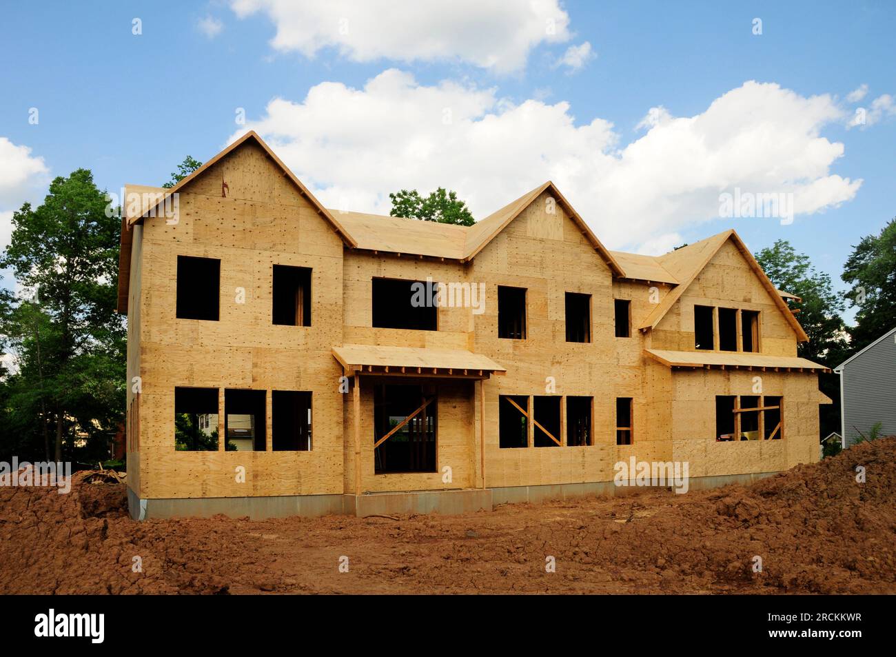 Large house under construction in the sheathing phase Stock Photo - Alamy