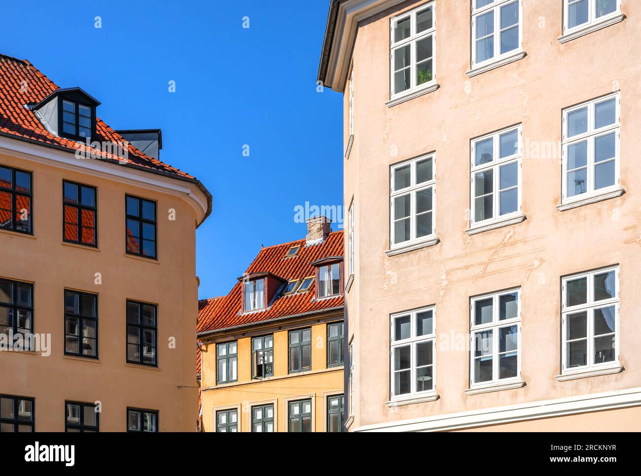 Traditional old houses on the street in Copenhagen, Denmark Stock Photo ...