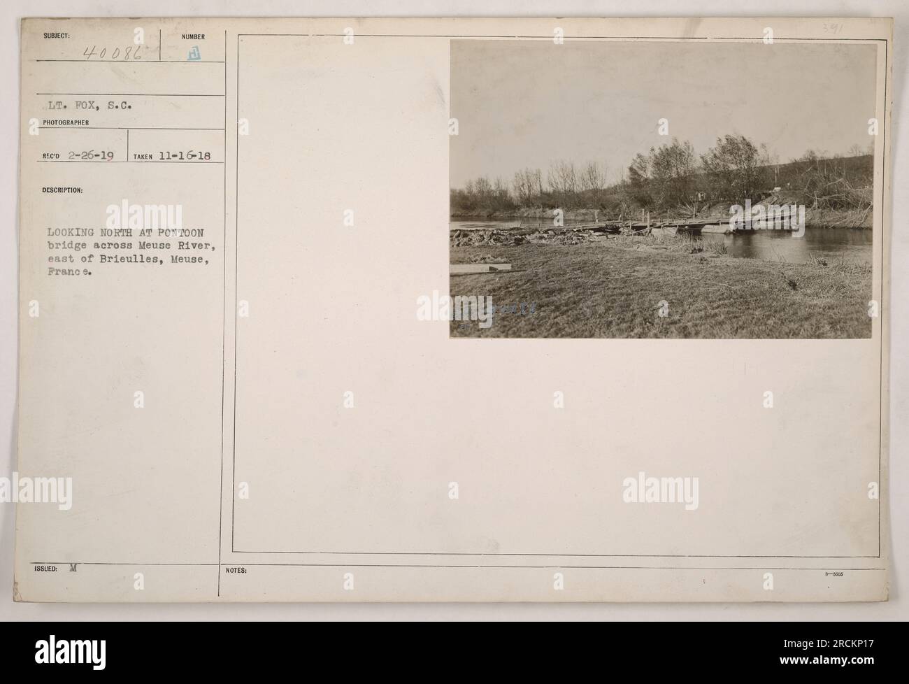 Soldiers stationed in Brieulles, Meuse, France, observe a pontoon ...