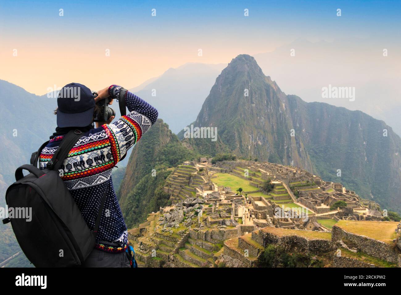 tourist and photographer taking photo at Machu Picchu, one of seven ...