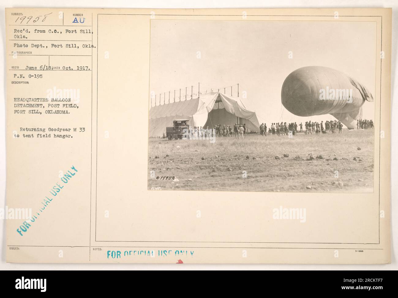 Soldiers returning a Goodyear M 33 balloon to the tent field hangar at ...