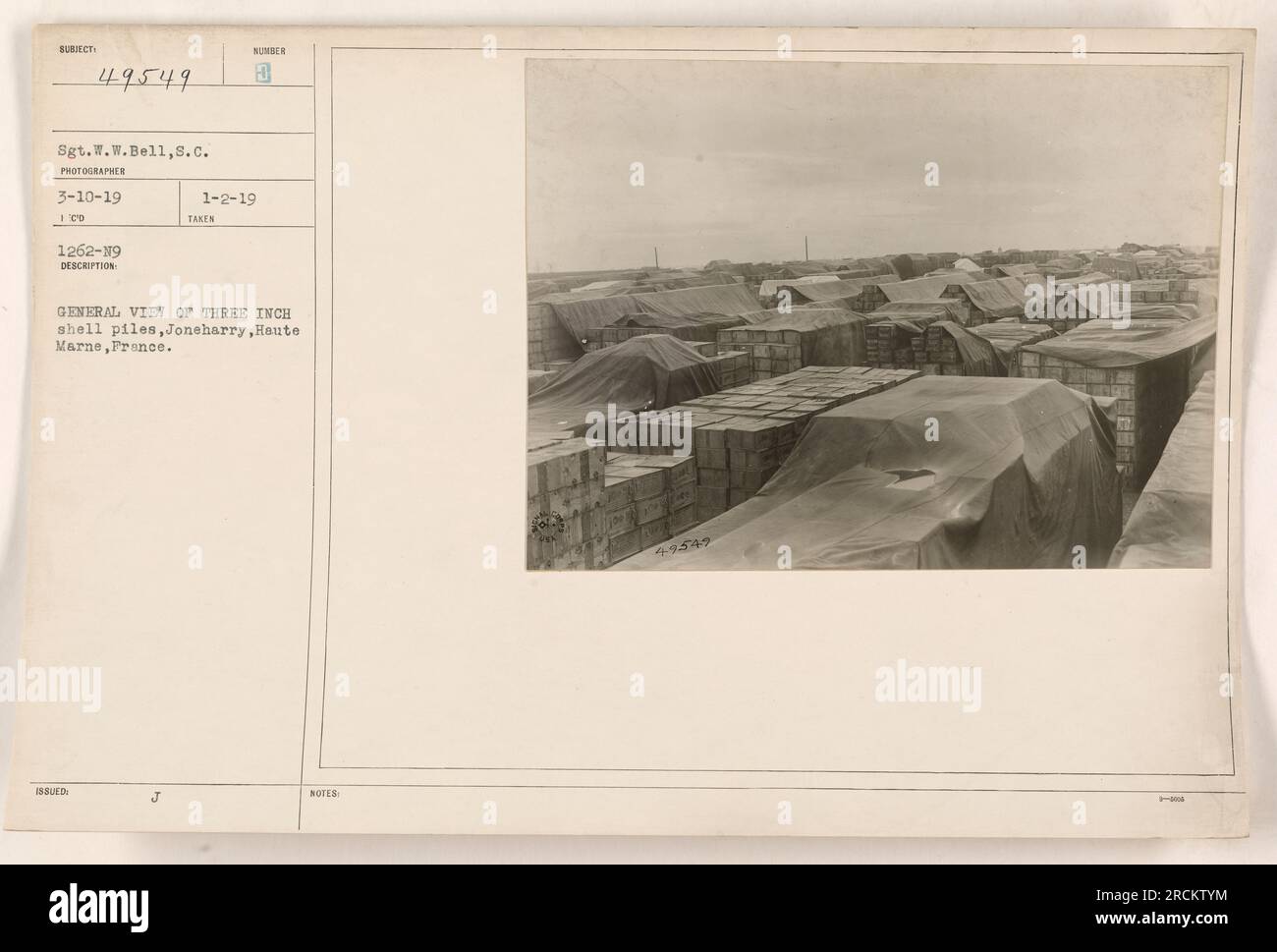 This photo captures a general view of three inch shell piles in ...