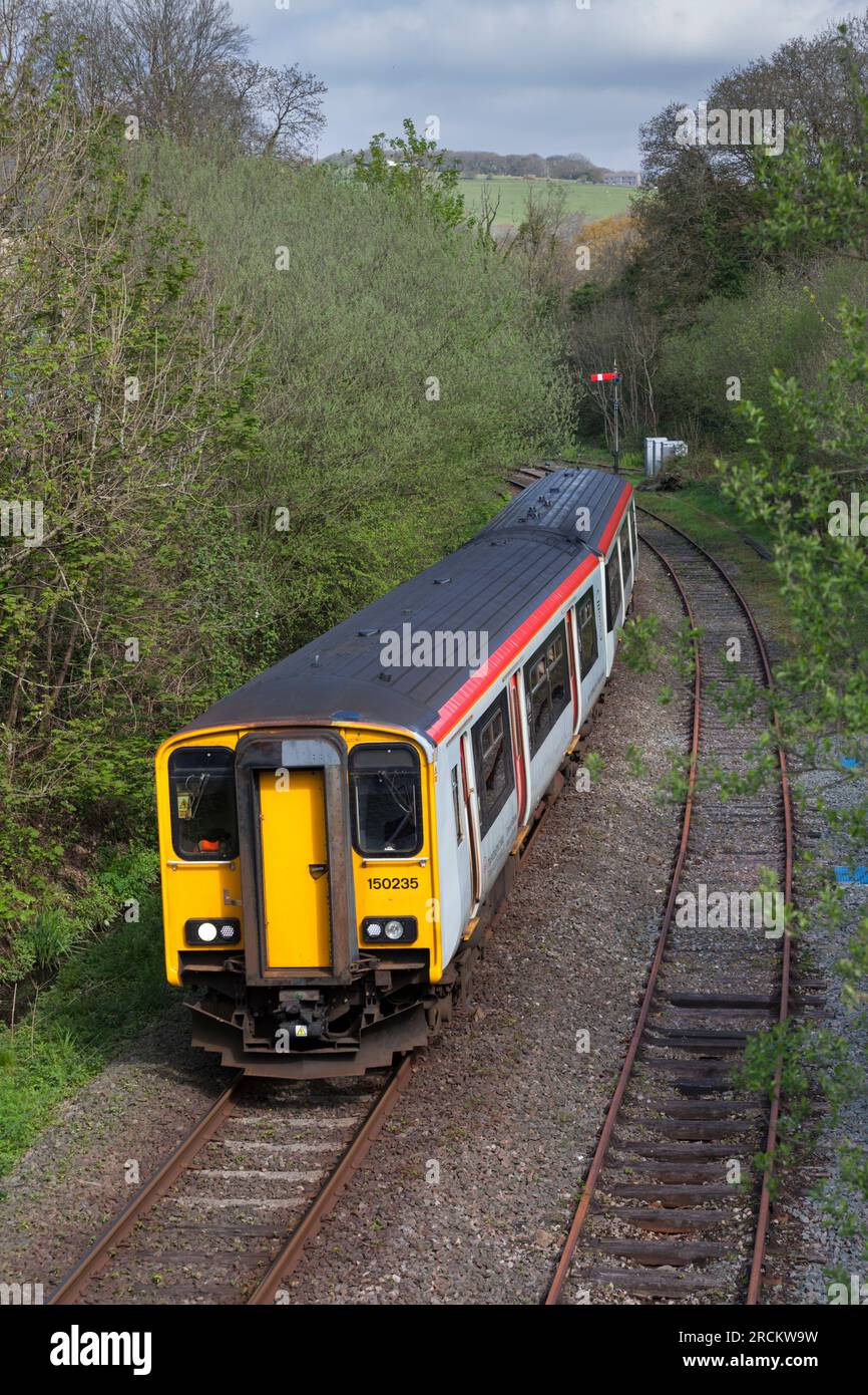 Transport For Wales class 150 diesel multiple unit train on the single track rural branch line ...