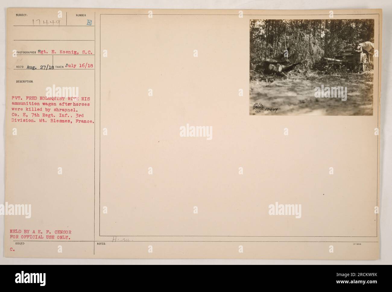 Pvt. Fred Holmquist stands next to his ammunition wagon after his ...