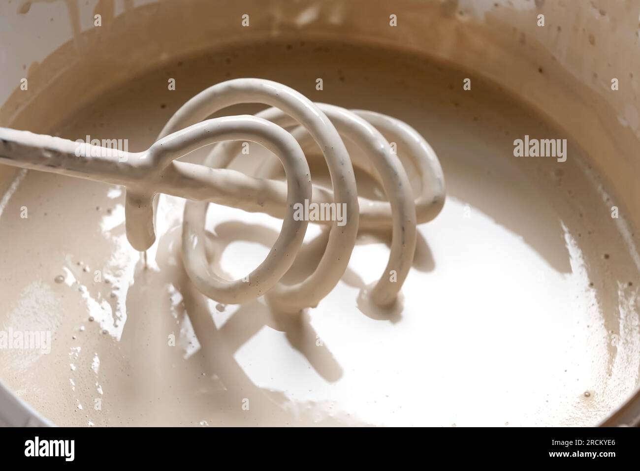 Mixer stirs white cream hi-res stock photography and images - Alamy