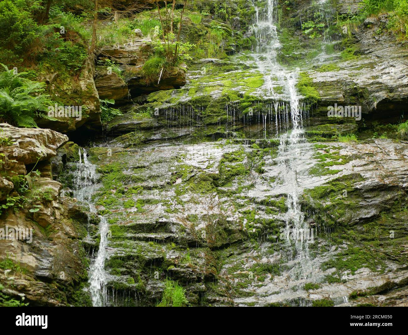 Waterfalls forest Vysoky vodopad, aerial drone stream way through ...