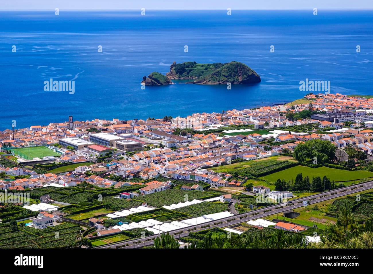 View of the Vila Franca Islet off the coast and the historic waterfront ...