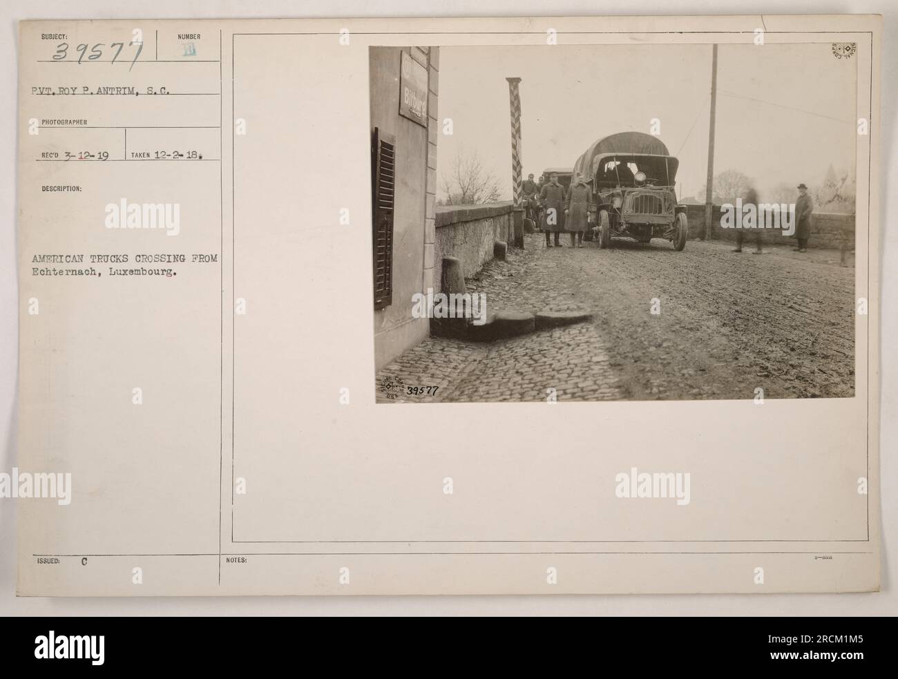 American military trucks crossing from Echternach, Luxembourg during ...