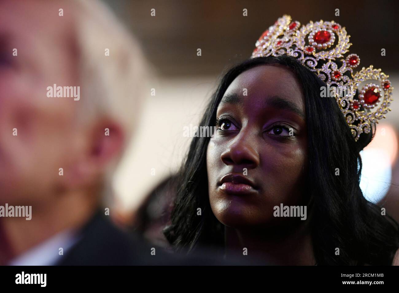 Edidiong Akpakpan watches Rev. Jesse Jackson announce that he is stepping down as the president ...