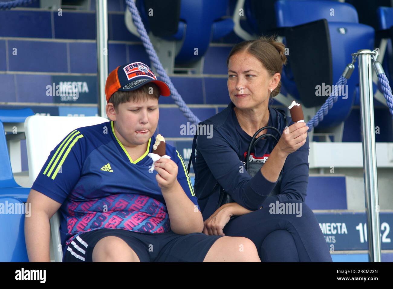 People, the audience are eating ice cream in action during the Pari ...