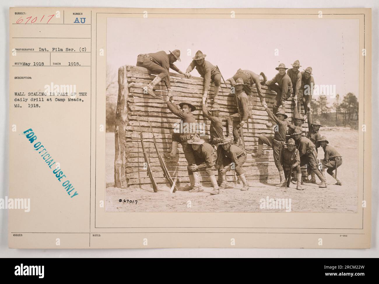 Soldiers at Camp Meade, Maryland practice wall scaling as part of their ...