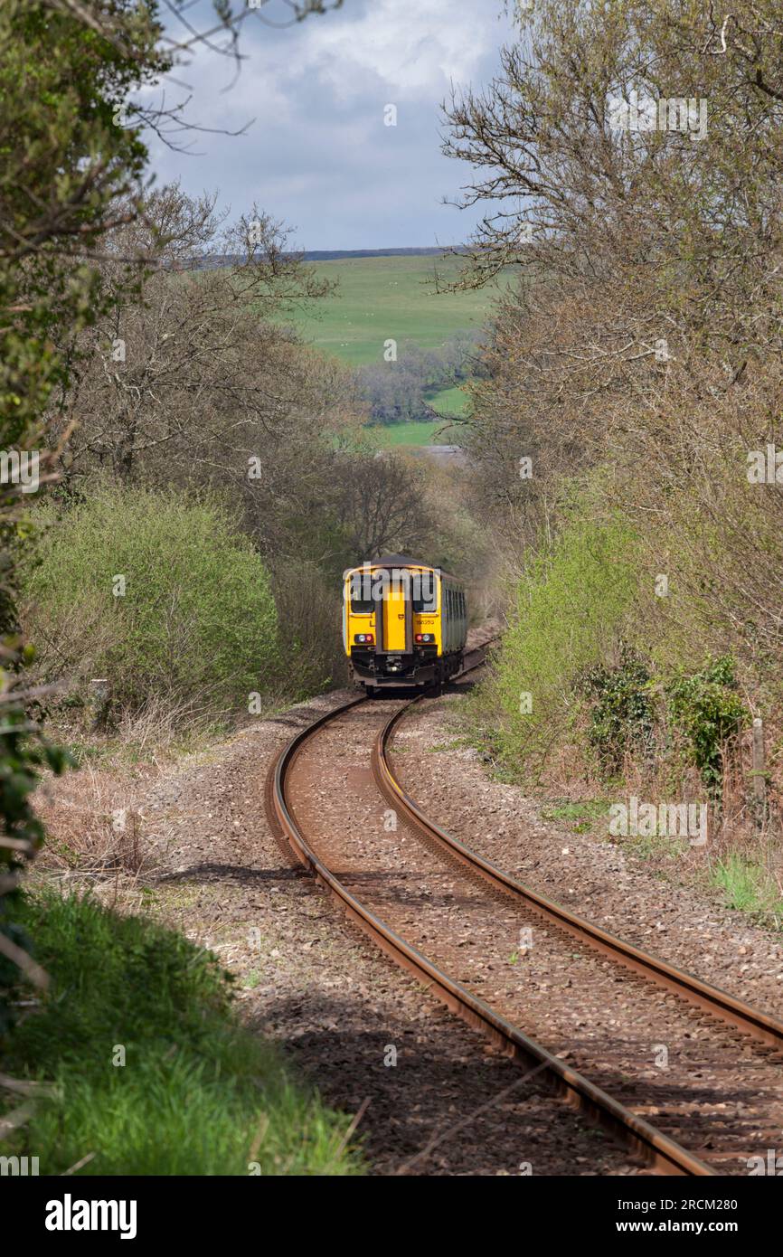 Transport For Wales class 150 diesel multiple unit train on the single track rural branch line ...