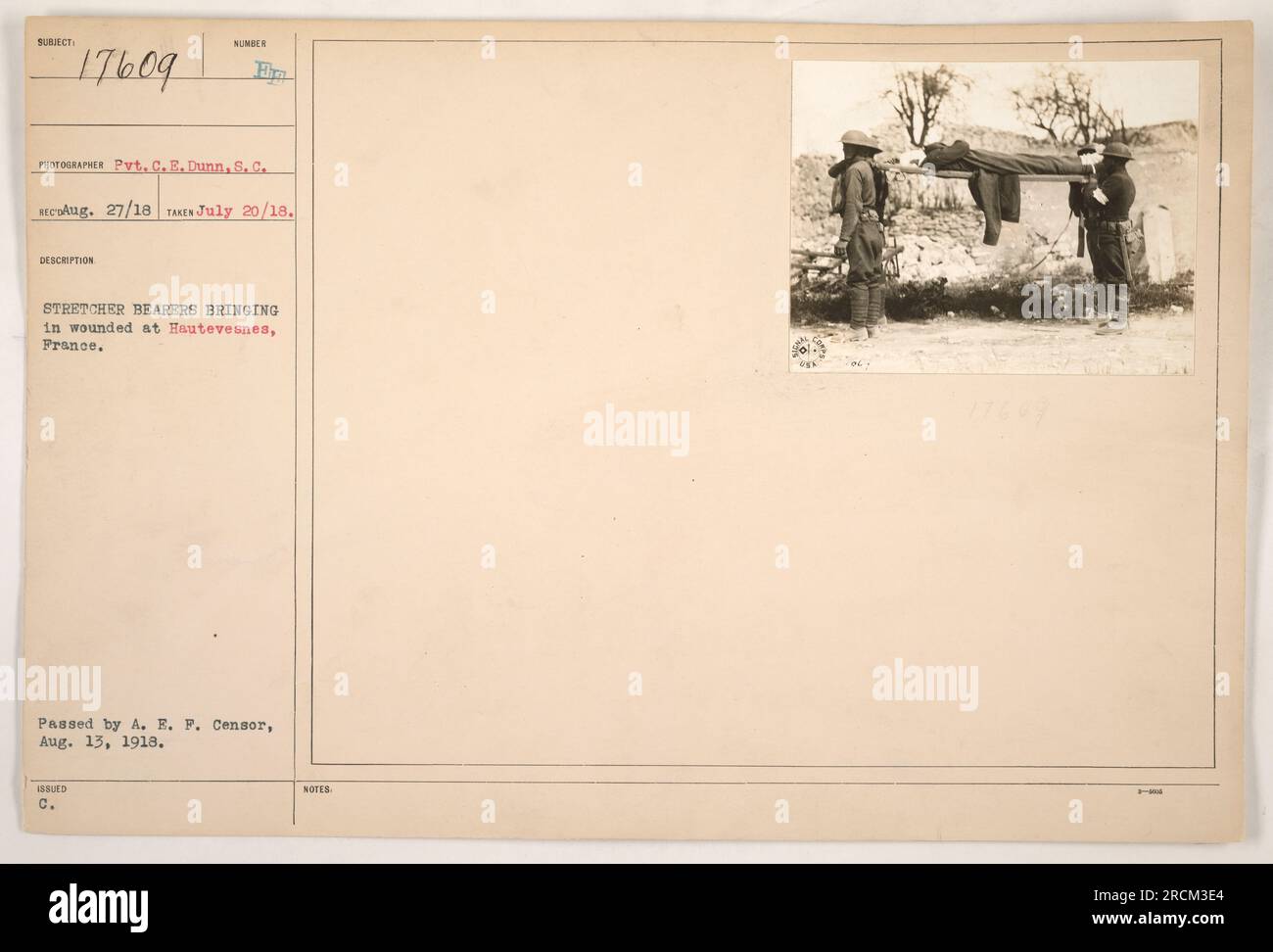 Stretcher bearers bringing wounded soldiers at Hautevesnes, France. Photograph taken on July 20 ...