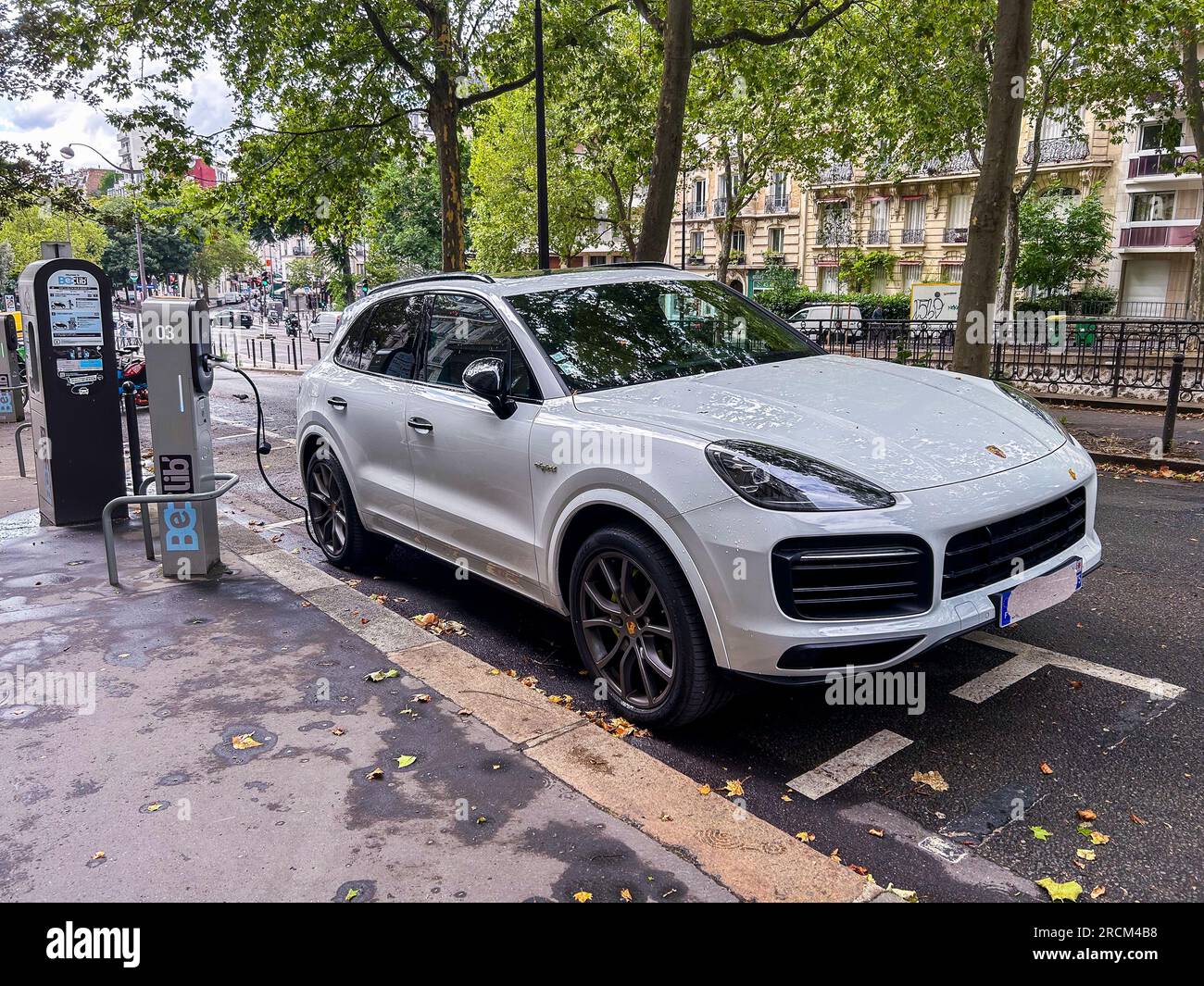 Paris, France, SUV Cars Electric Parked on Street, Plug-in Charger ...