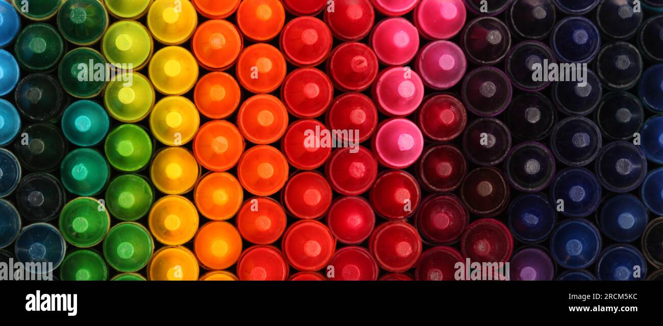 Box of crayons in a rainbow of colors background Stock Photo - Alamy
