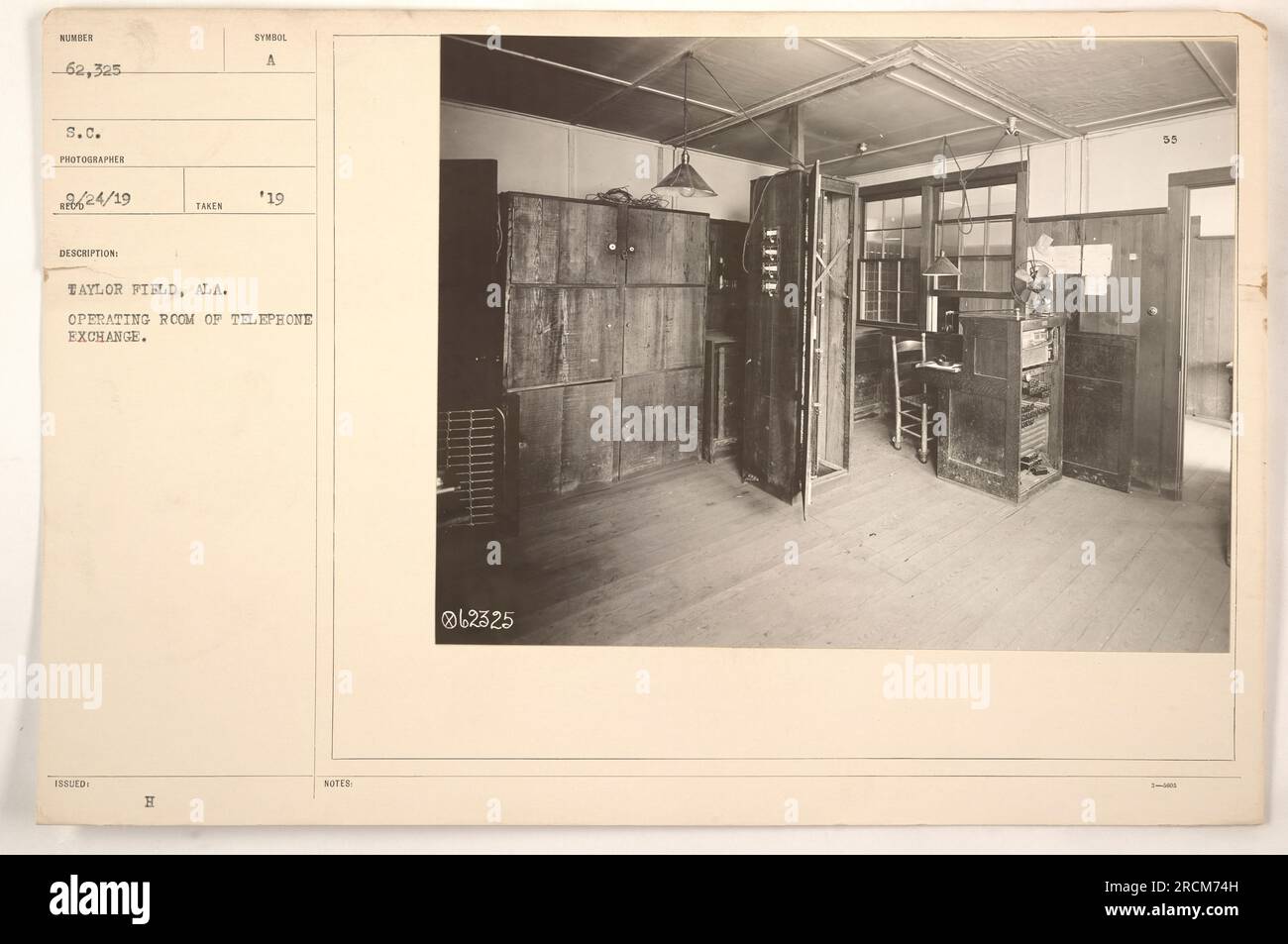 Operating room of telephone exchange at Taylor Field, Alabama during ...