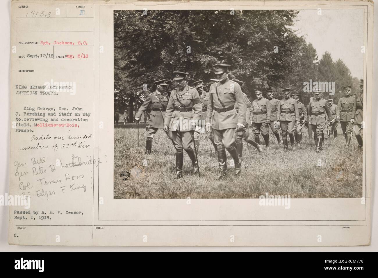 King George decorating American troops. Gen. John J. Pershing and staff ...