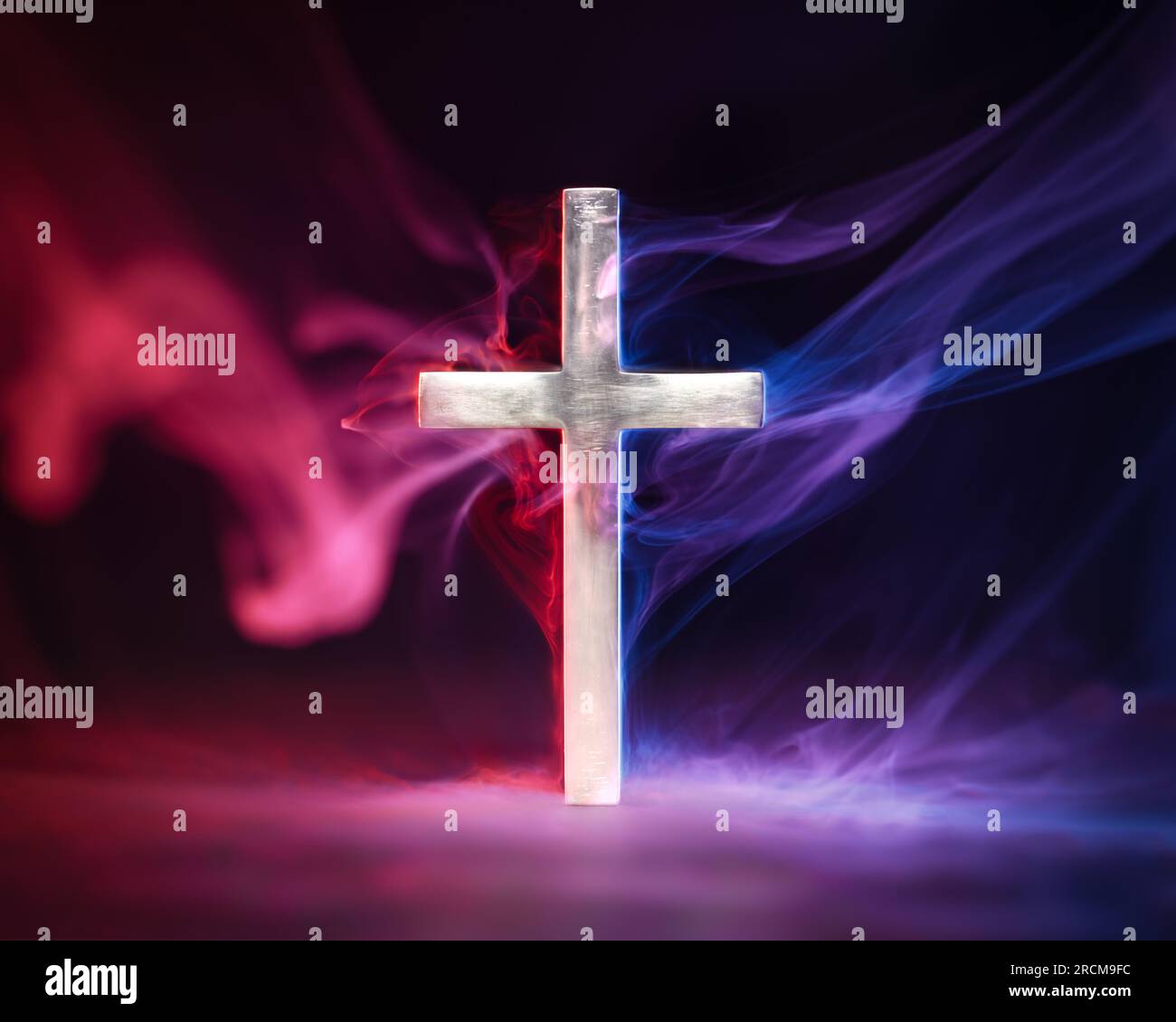 Religious cross emanating red and blue smoke symbolizing Heaven and ...