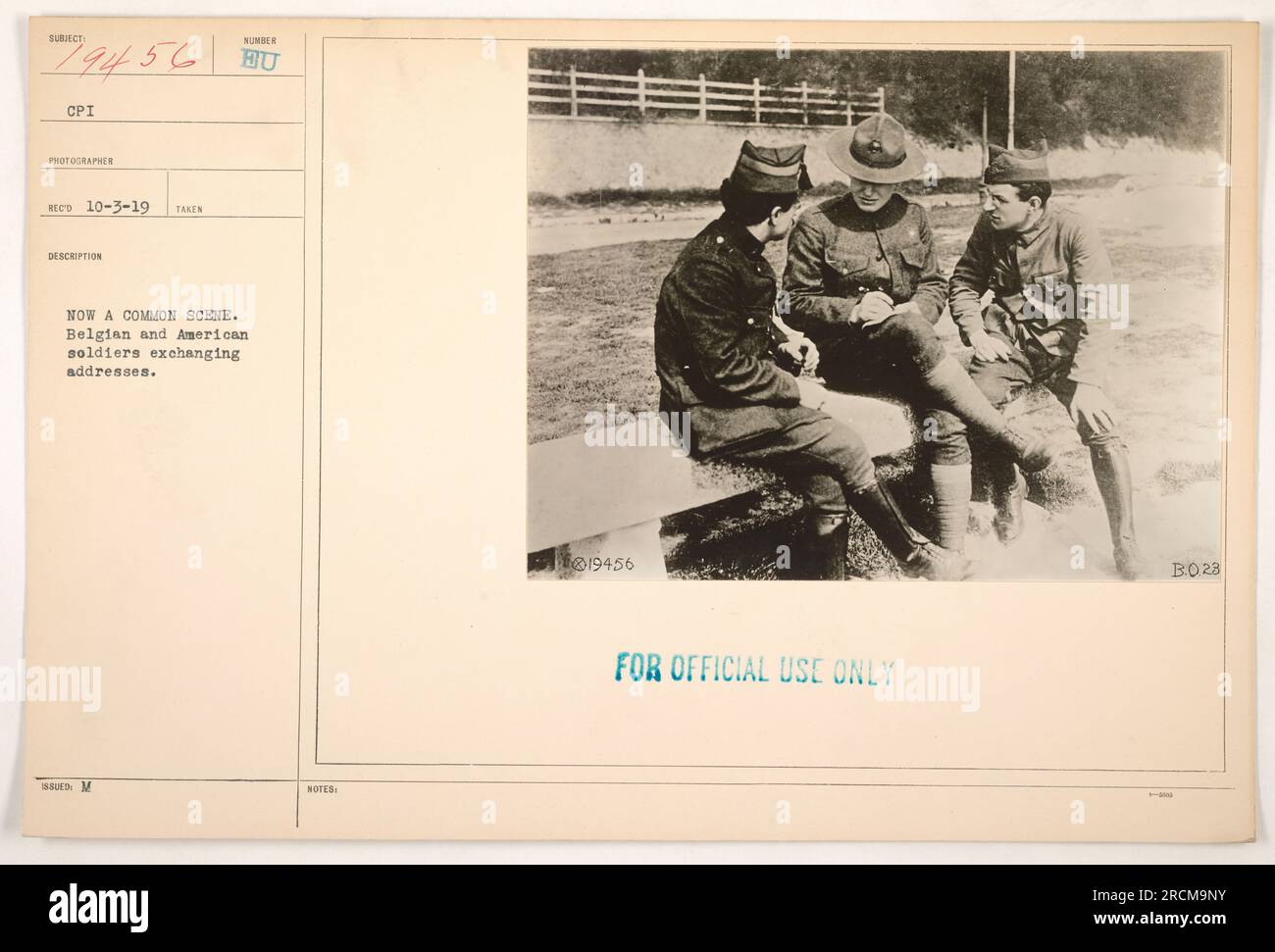 Belgian and American soldiers during World War One exchanging addresses ...