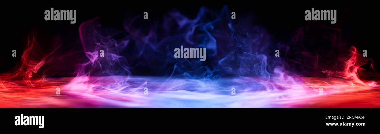 Dramatic smoke and fog in contrasting vivid red, blue, and purple ...