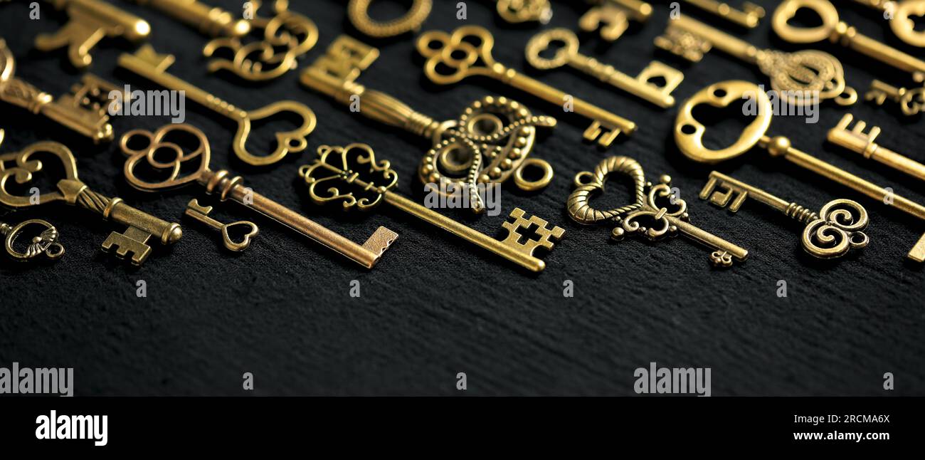 Vintage Victorian style golden skeleton keys. Concepts of keys to ...