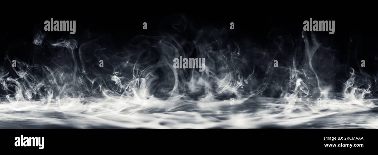 Real smoke swirling upwards. Dramatic smoke or fog effect for spooky ...