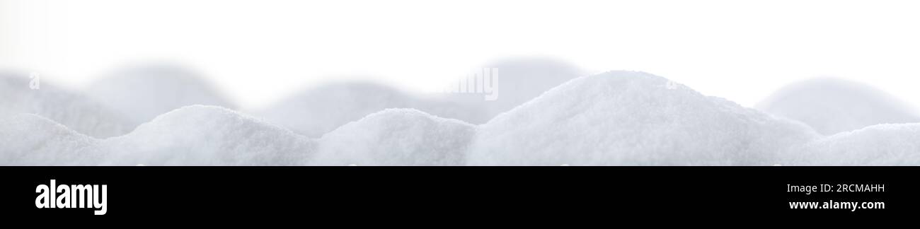 Banner of sparkling fluffy white snow hills. Wintertime snow border ...