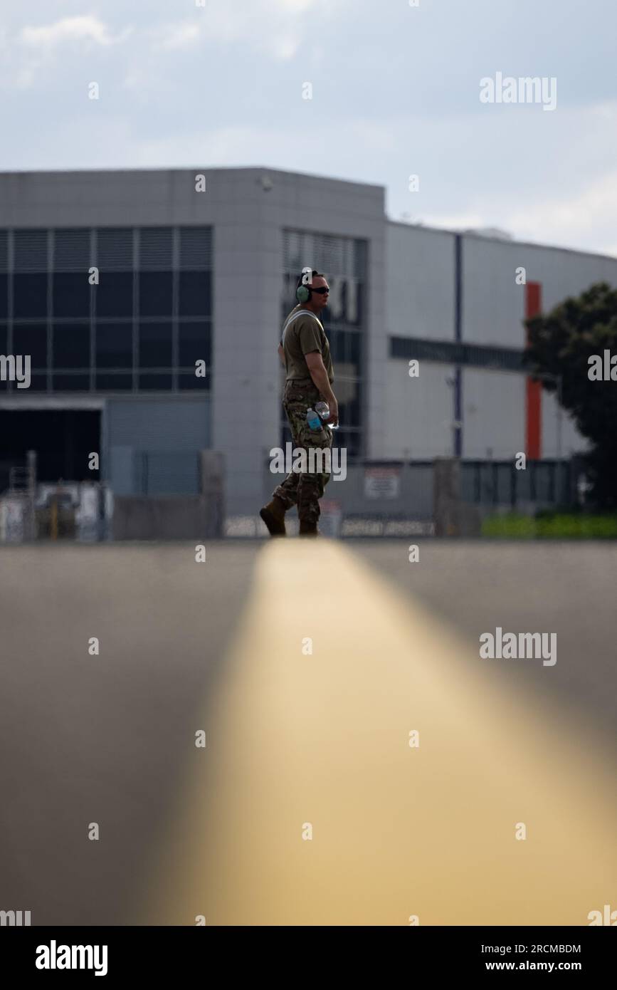 A U.S. Air Force Airman with the 733rd Air Mobility Squadron observes ...