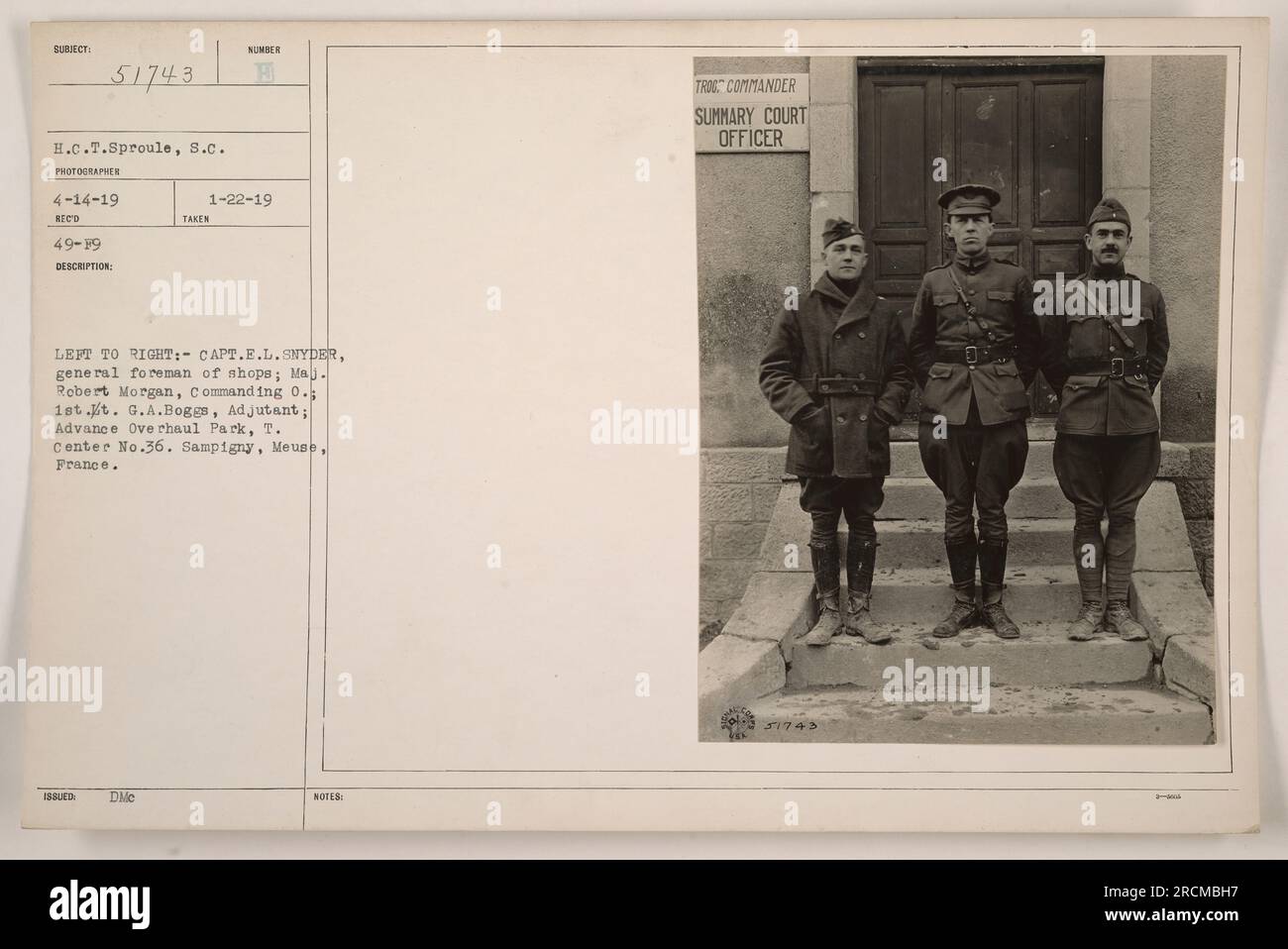 Caption: From left to right: Capt. E.L. Snyder, general foreman of ...