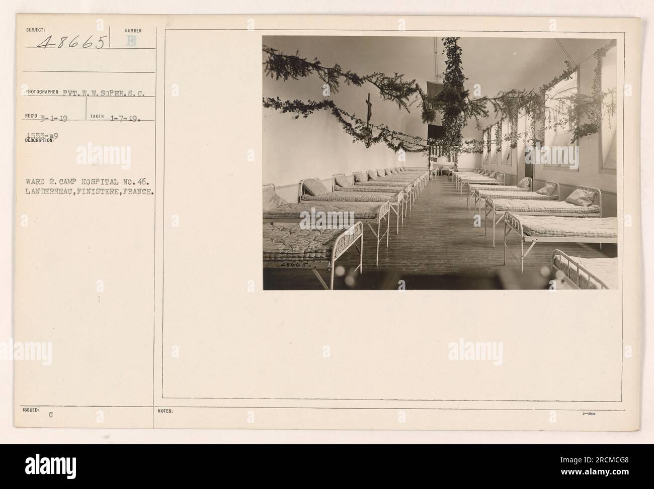 A black and white photograph shows Ward 2 in Camp Hospital No. 46 ...