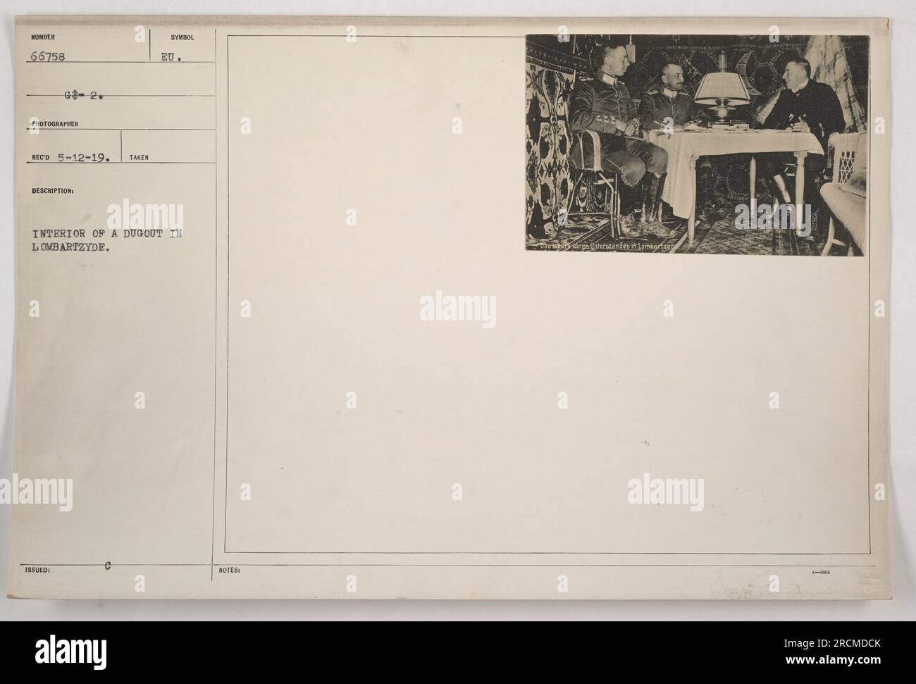 This photograph shows the interior of a dugout in Lombartzyde during ...