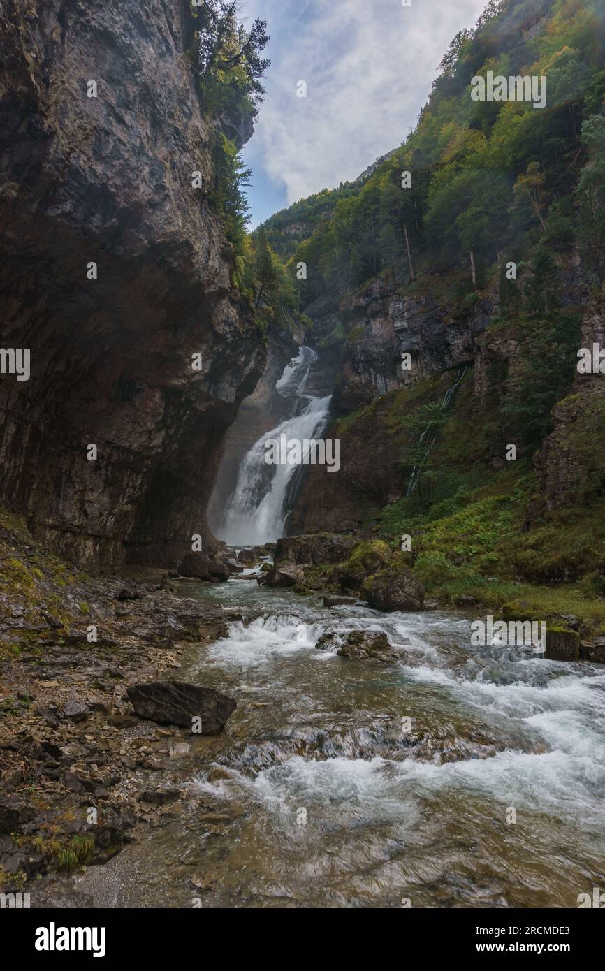 Amazing waterfall Cascada de la Cueva of rio Arazas in the National ...