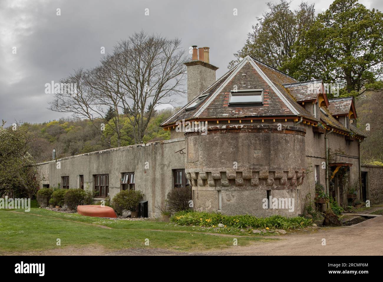 Strange corner house near to a castle in Scotland Stock Photo - Alamy