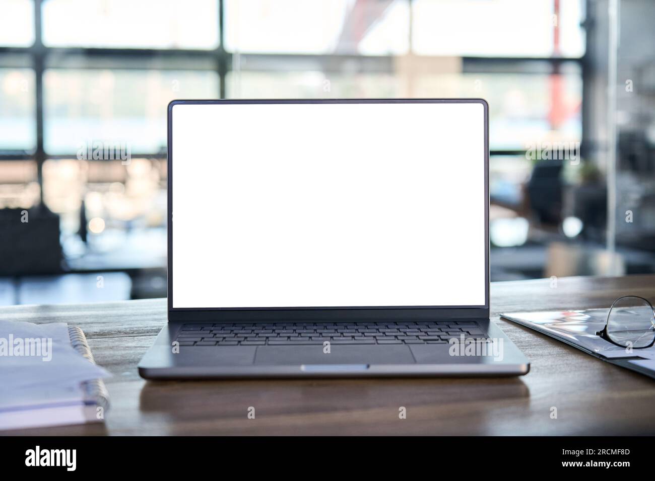 Laptop computer mock up template screen on office workplace desk Stock ...