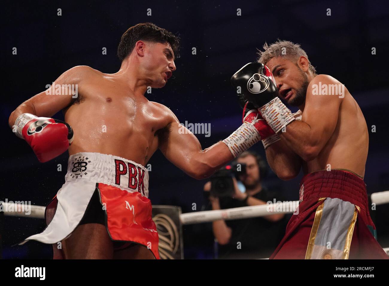 Gabriel Corzo (right) and Josh Kelly in action during the WBO ...