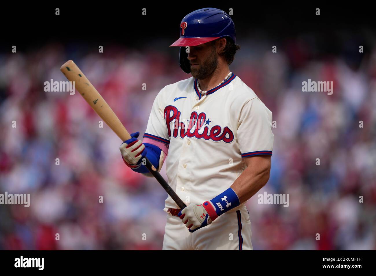 Philadelphia Phillies' Bryce Harper prepares to bat during the first baseball game in a ...