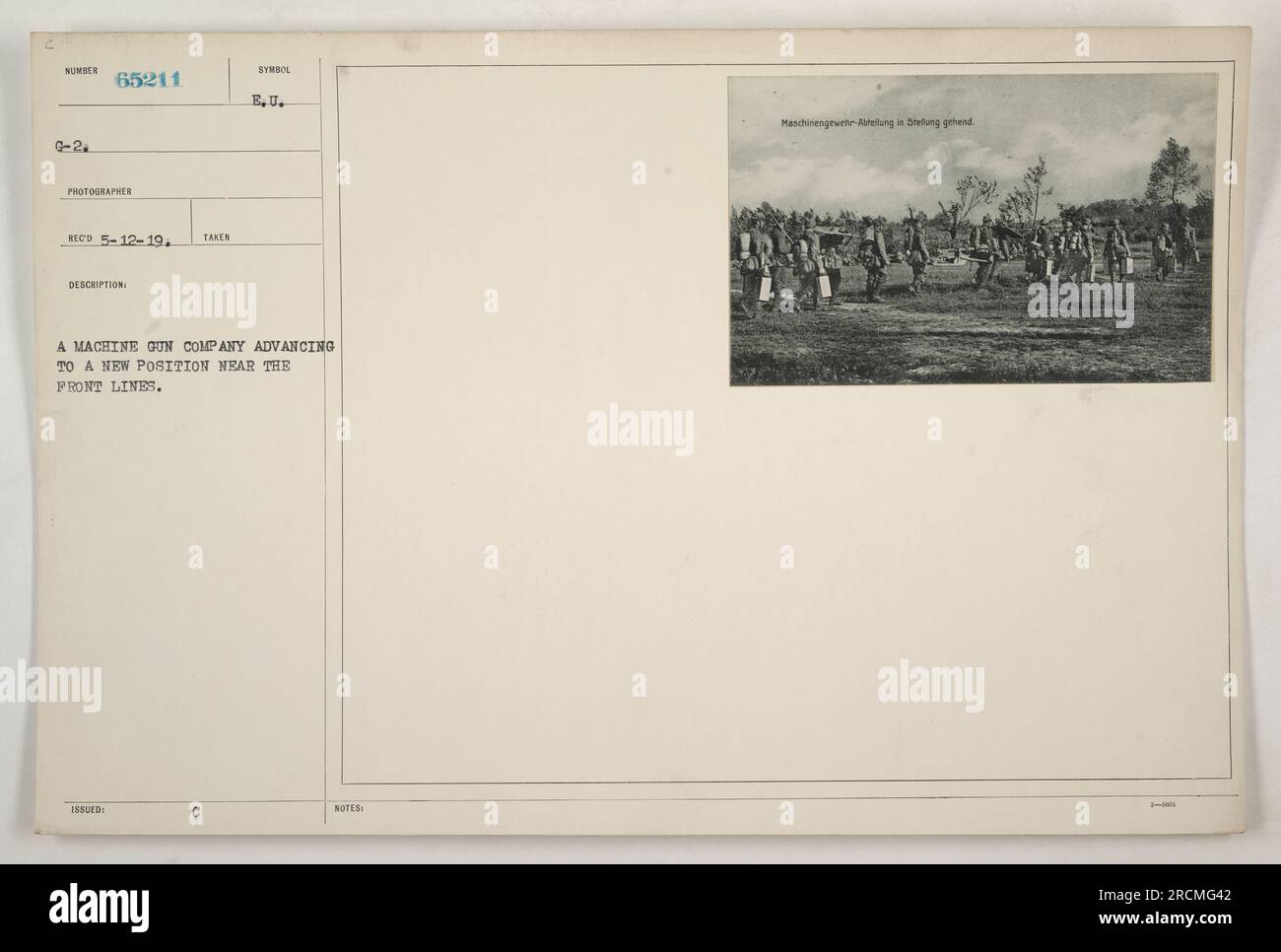 A machine gun company is seen advancing to a new position near the ...