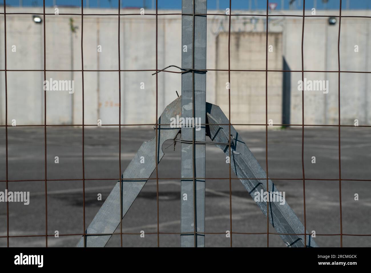 post border with wire mesh. Galvanized posts, anonymous fence. borders ...