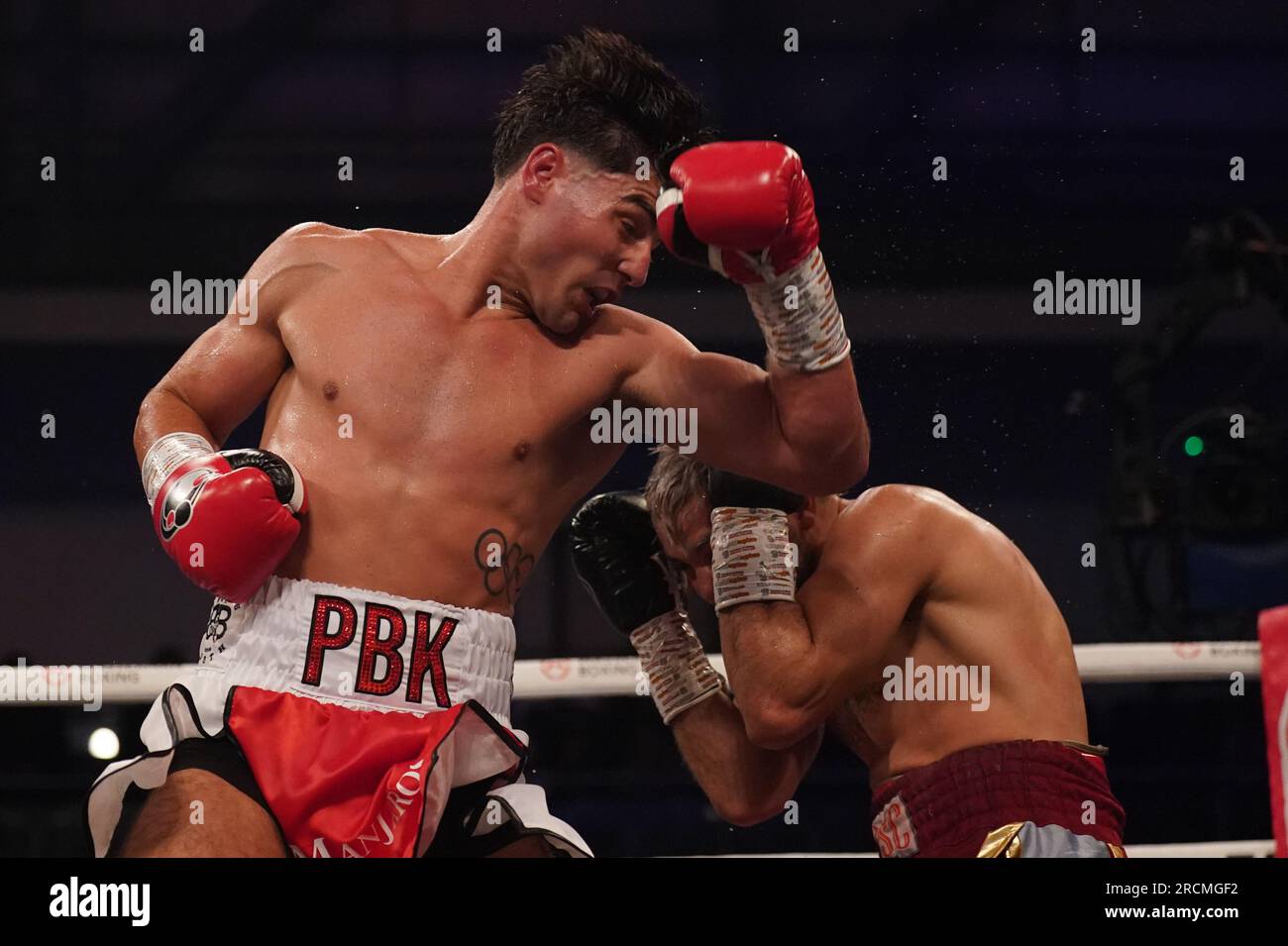 Gabriel Corzo (right) and Josh Kelly in action during the WBO ...