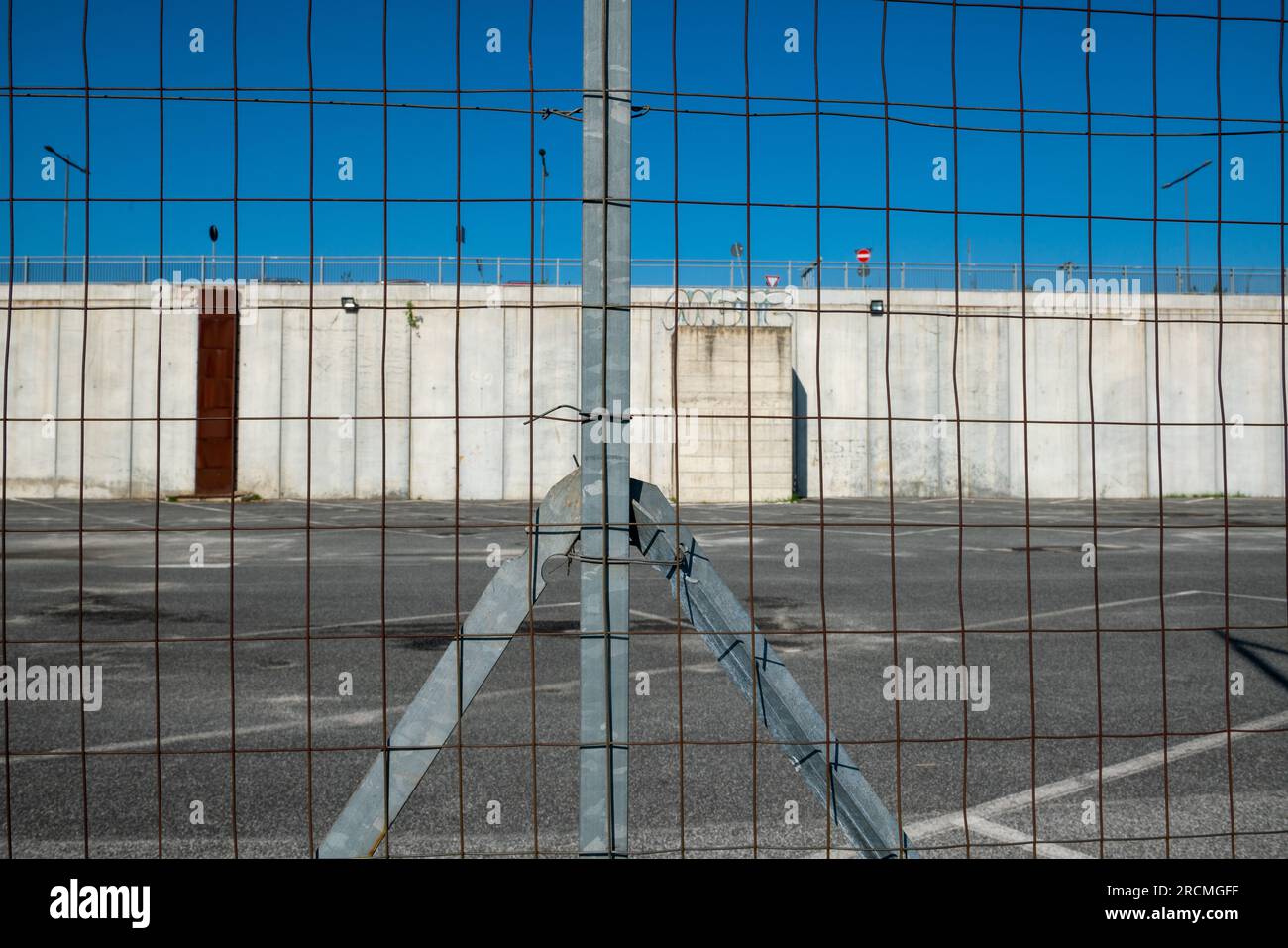 post border with wire mesh. Galvanized posts, anonymous fence. borders ...