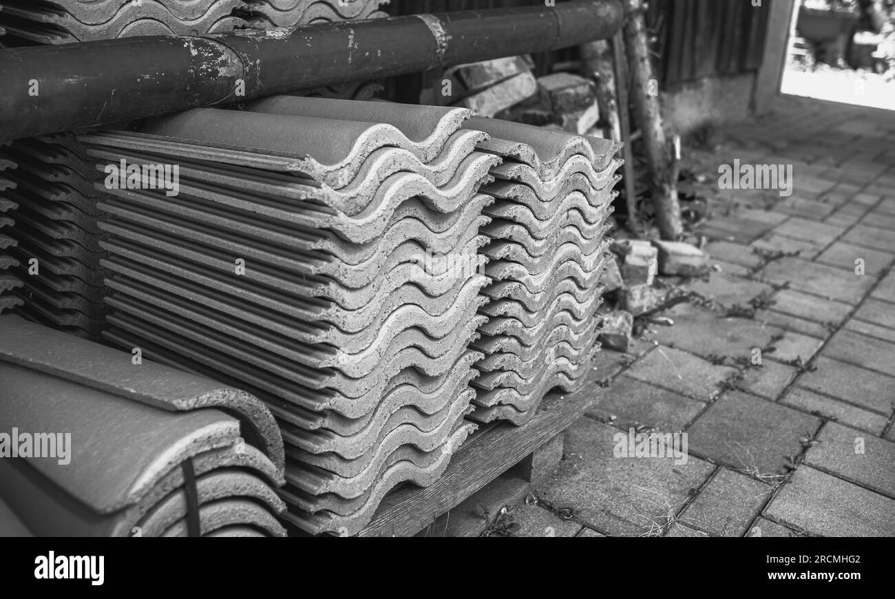 Red ceramic roof tiles stack in backyard. High quality photo Stock ...