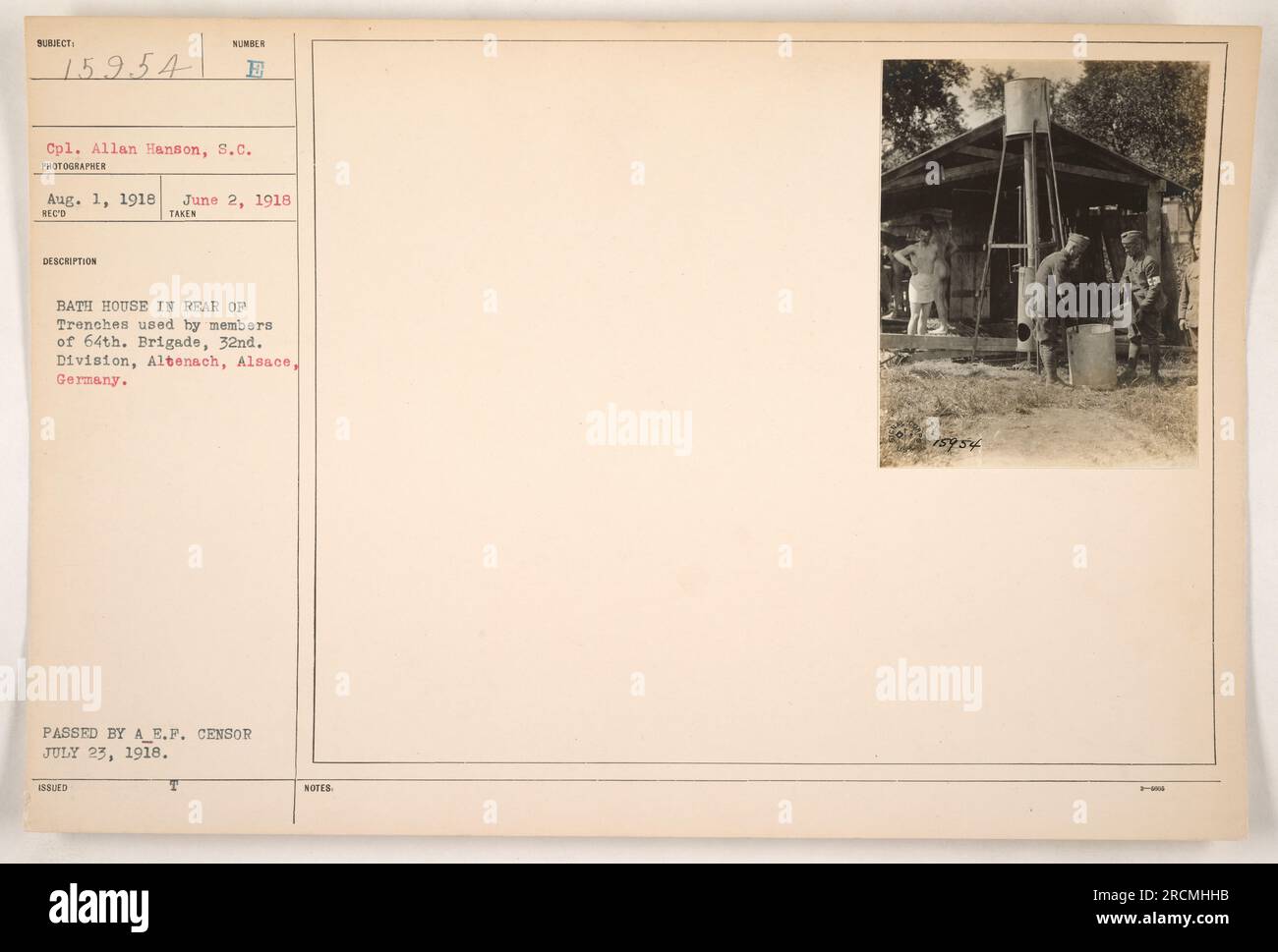 Caption: "Cpl. Allan Hanson of the Signal Corps at the bath house in ...