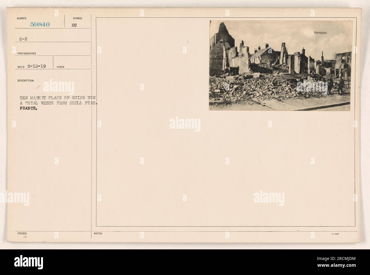 A photograph showing the market place of Guise, France, heavily damaged ...