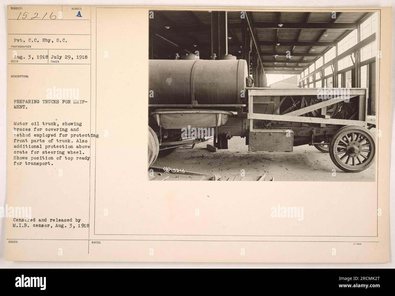 Image showing Pvt. C.C. Eby preparing trucks for shipment during World ...