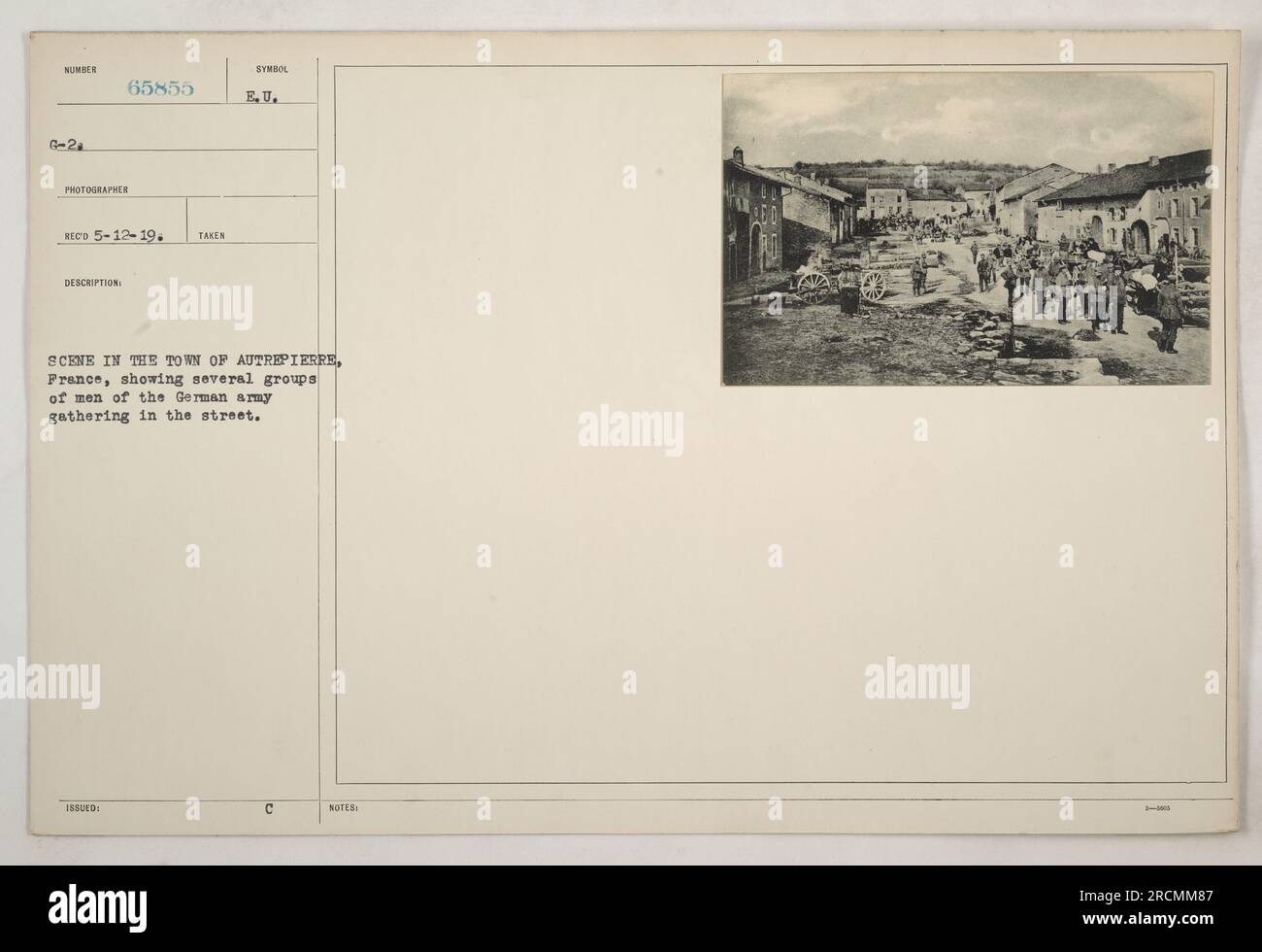 Image shows German soldiers gathering in the streets of Autrepierre ...