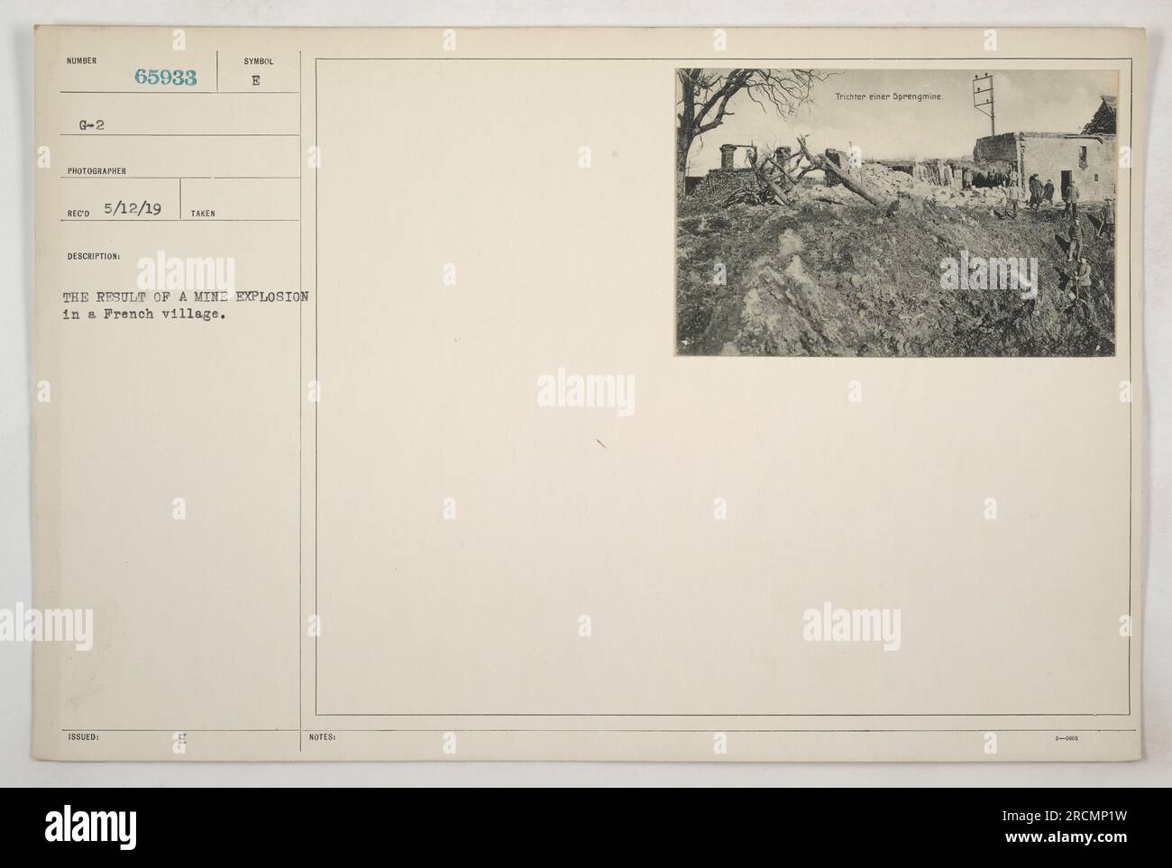 Damage caused by a mine explosion in a French village during World War ...