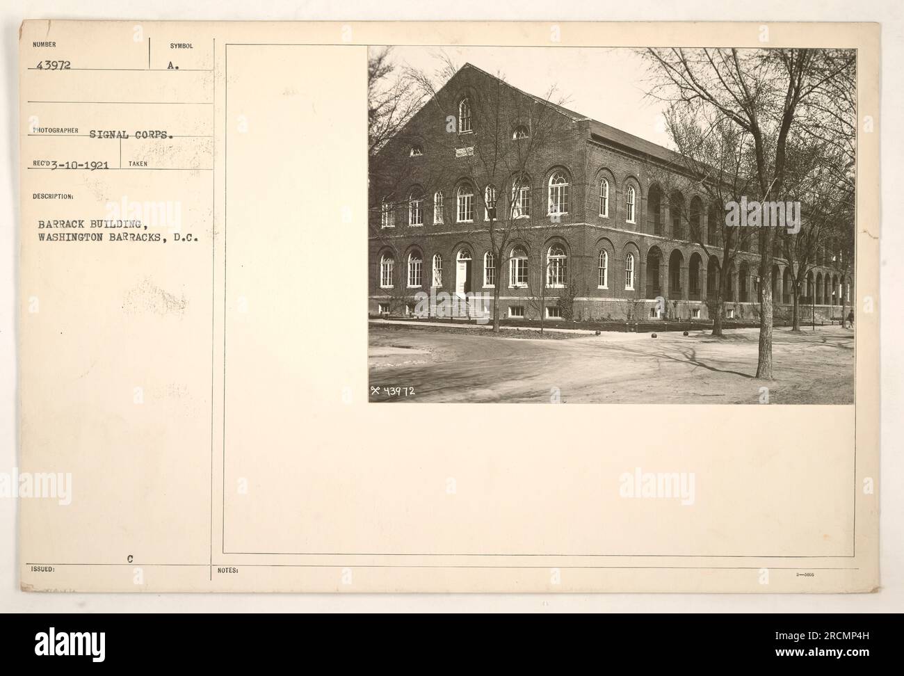 Soldiers entering a barrack building at Washington Barracks, D.C. in a ...