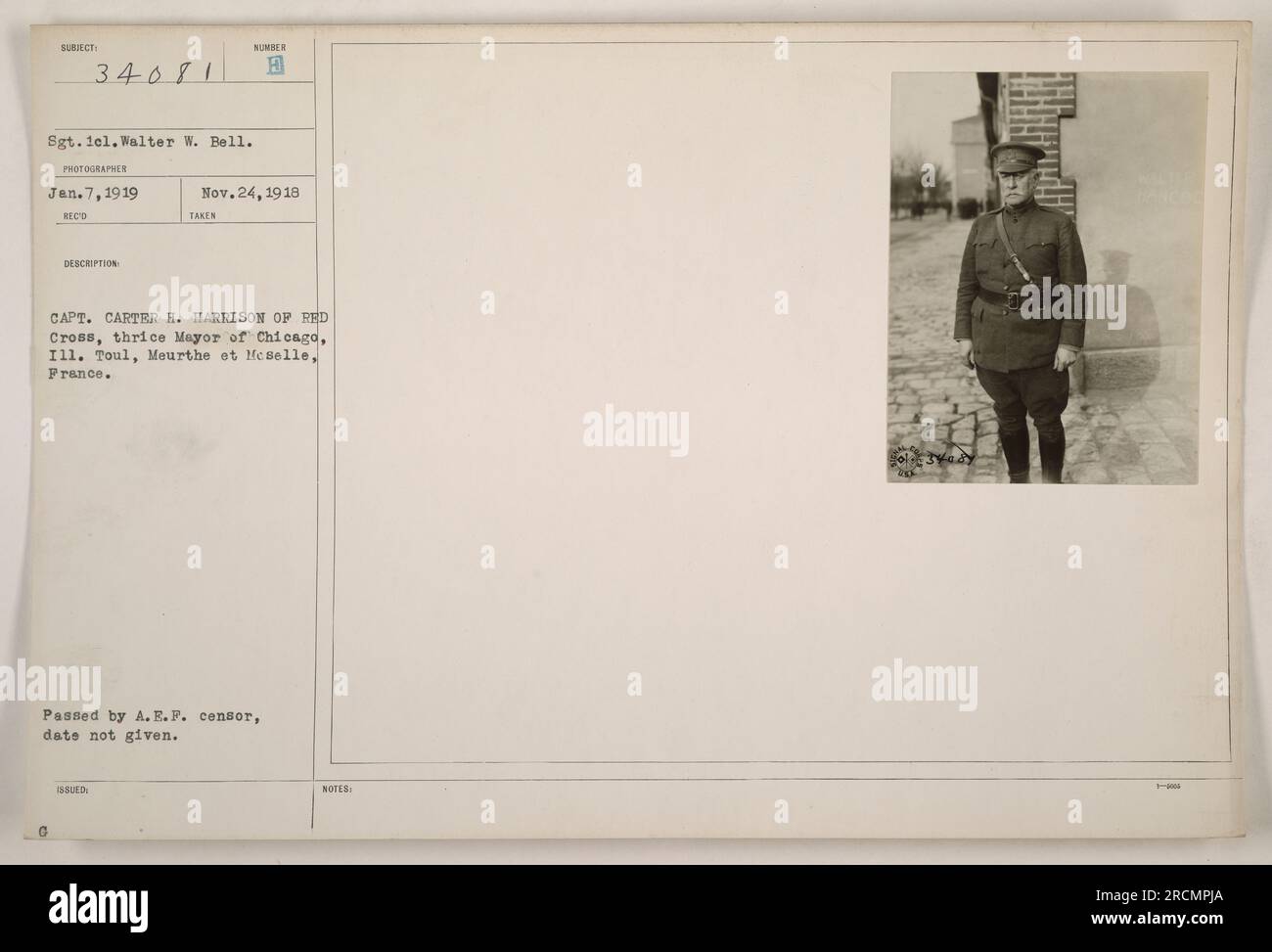 Sgt. Walter W. Bell takes a photograph of Capt. Carter H. Harrison of ...