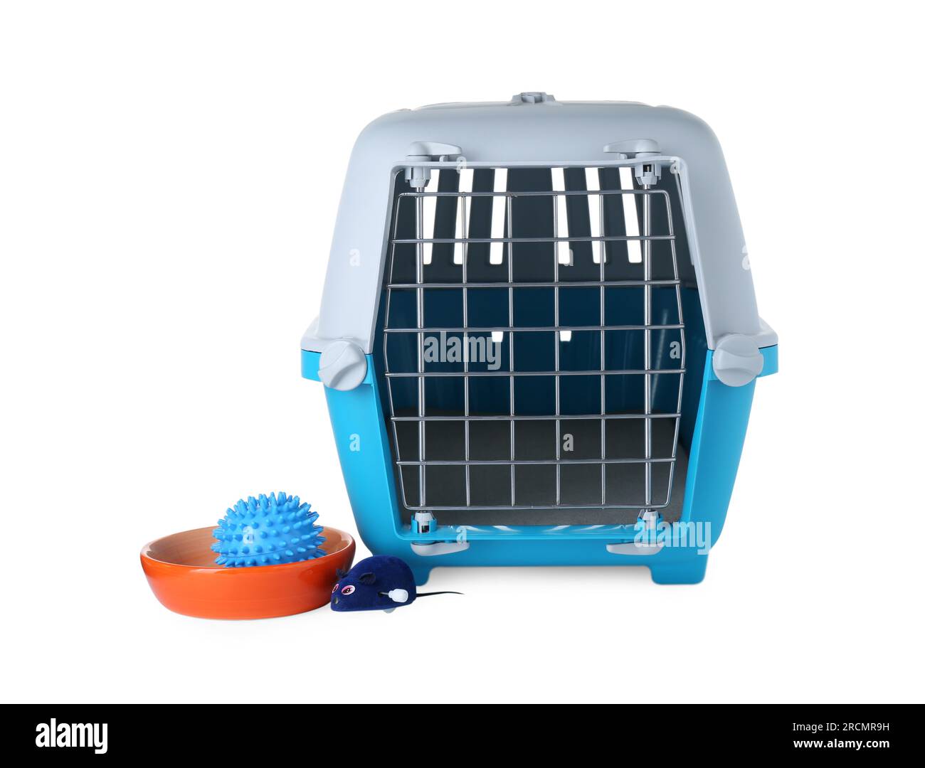 Light blue pet carrier and bowl with toy isolated on white Stock Photo ...